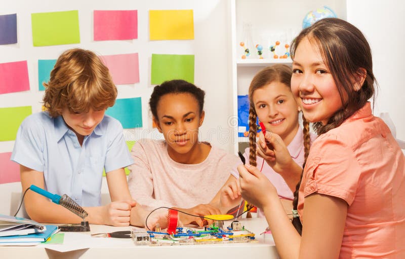 Students Creating Electric Chain Model at the Desk Stock Image - Image ...