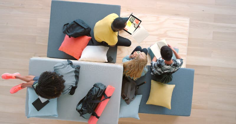Students, Creative Startup and Intern People Sitting on Couch in Hybrid ...