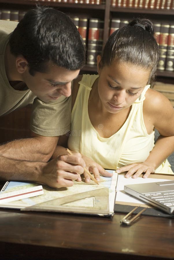Students at desk- Vertical stock photo. Image of caucasian - 6213620