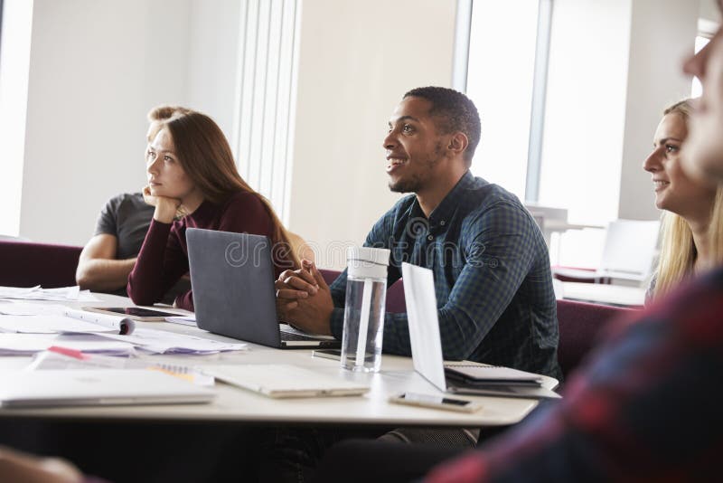 Students at Desks Attending Lecture on Campus Stock Image - Image of ...