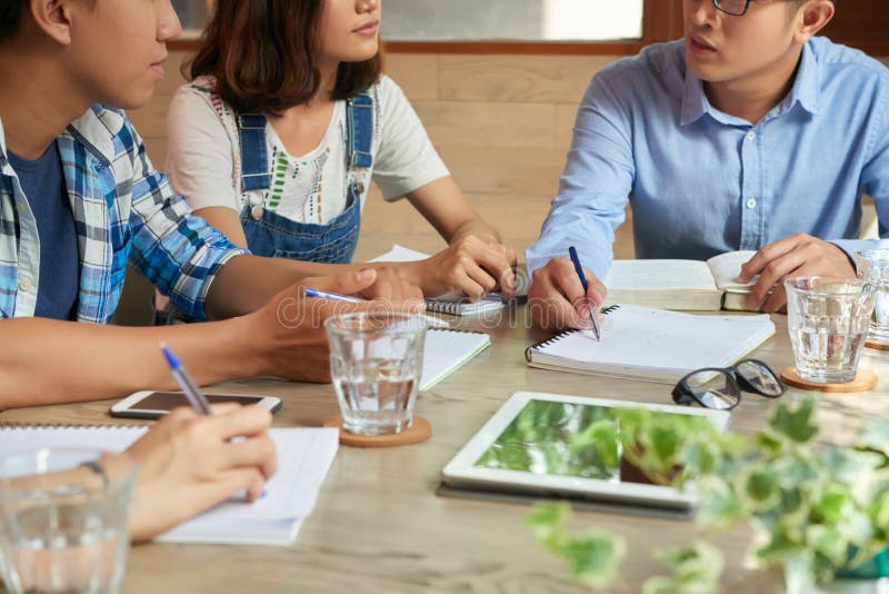 Students Discussing Homework Stock Image - Image of people, idea: 111897211