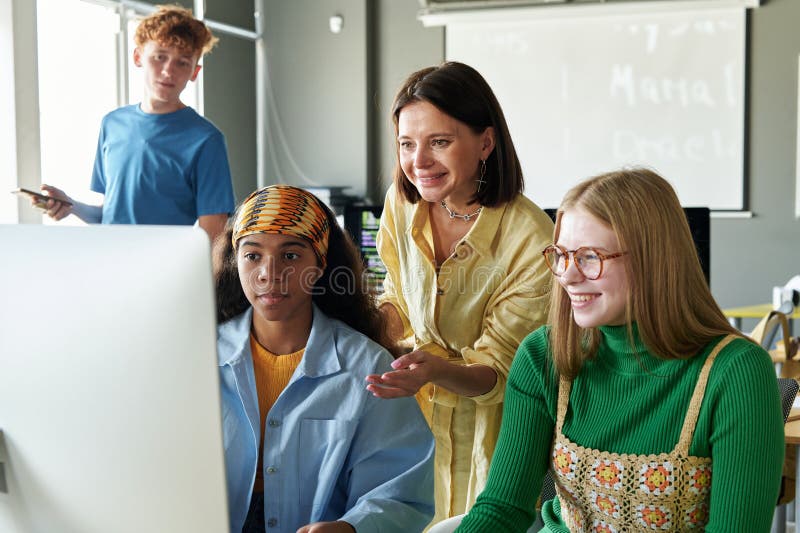 Students Discussing Presentation with Teacher Stock Photo - Image of ...