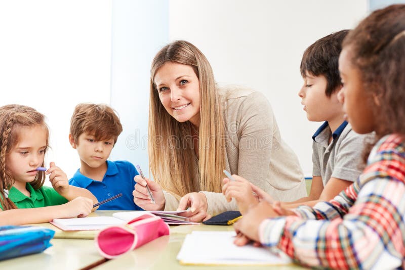 Students Do Homework with a Teacher Stock Image - Image of learn ...