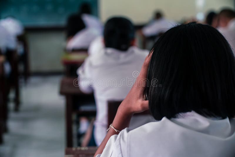 Students Doing Exam Answer Sheets Exercises in Classroom of School with ...