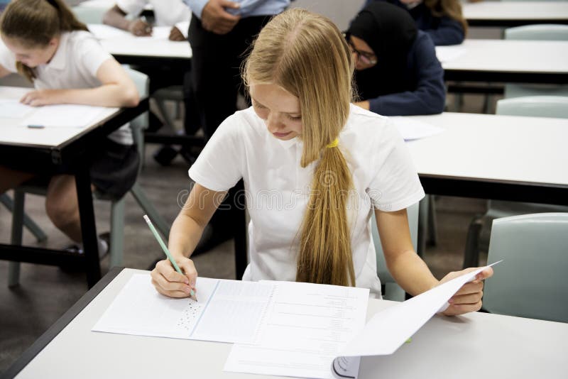 Students Doing the Exam in Classroom Stock Image - Image of high ...