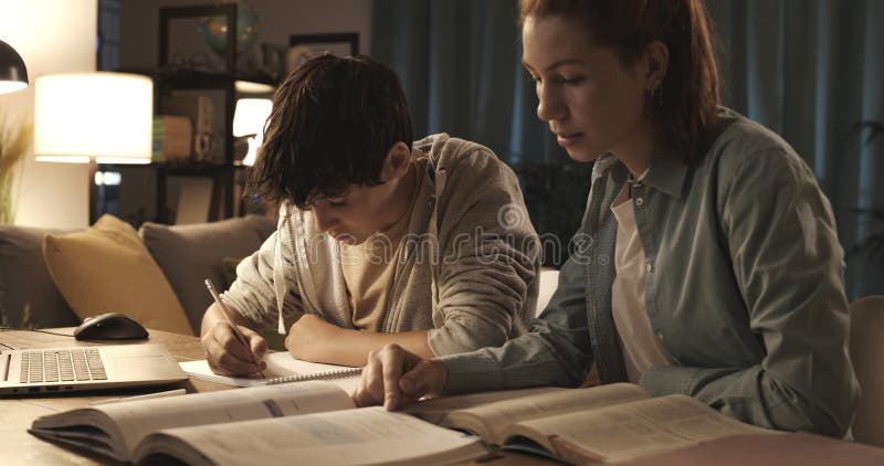 Students Doing Homework at Home Stock Image - Image of desktop, brother ...