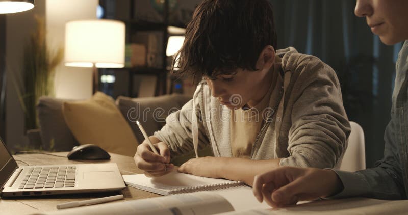 Students Doing Homework at Home Stock Photo - Image of friends ...