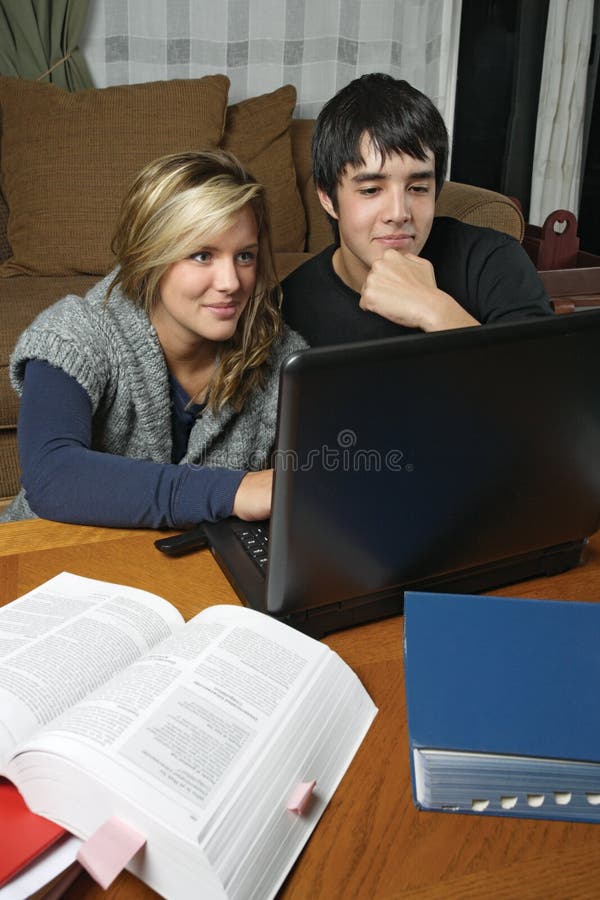 Students Doing Homework with Laptop Stock Image - Image of studying ...
