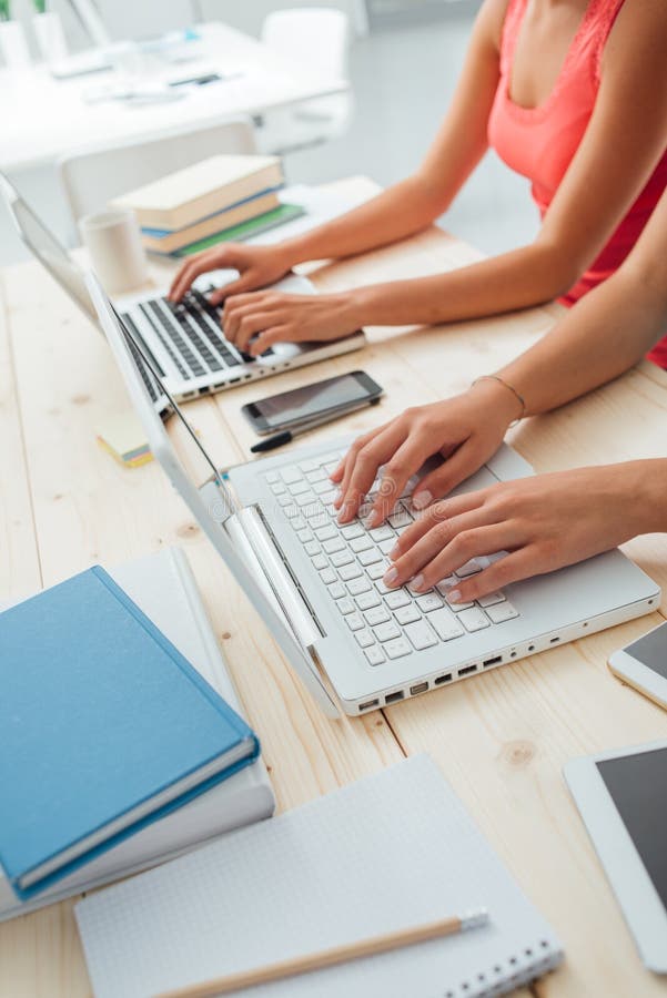 Students Doing Homeworks at Desk Stock Image - Image of books, homework ...