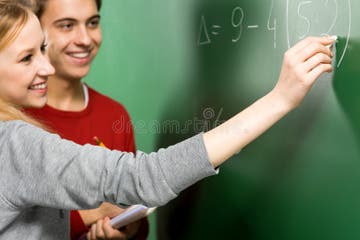 Students Doing Math on Chalkboard Stock Image - Image of learning ...