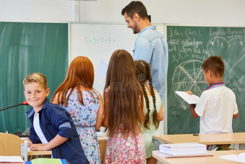 Students Doing Mathematics with Teacher in Classroom Stock Photo ...