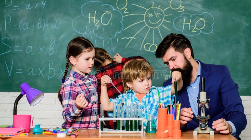 Students Doing Science Experiments with Microscope in Lab. School Kids ...