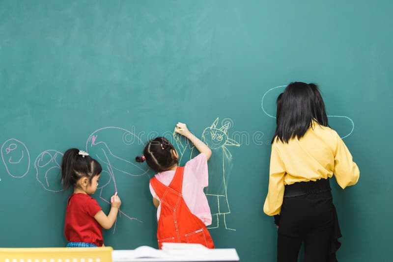 Students Drawing on Green Board Stock Image - Image of happy, clever ...
