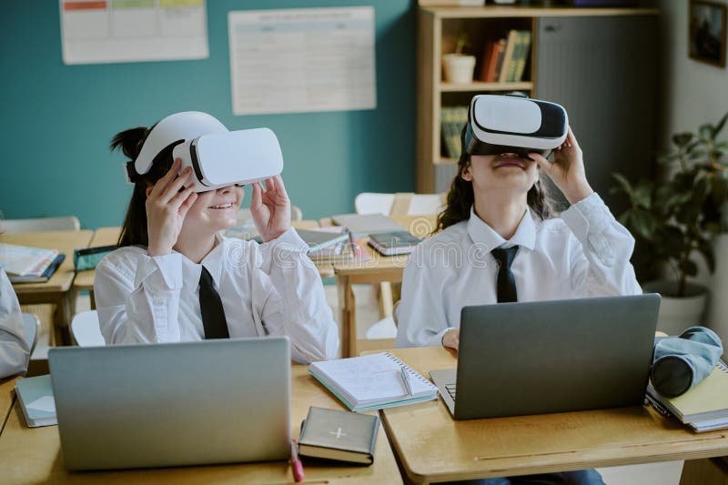 Students Engaging with Virtual Reality Headsets in Classroom Stock ...