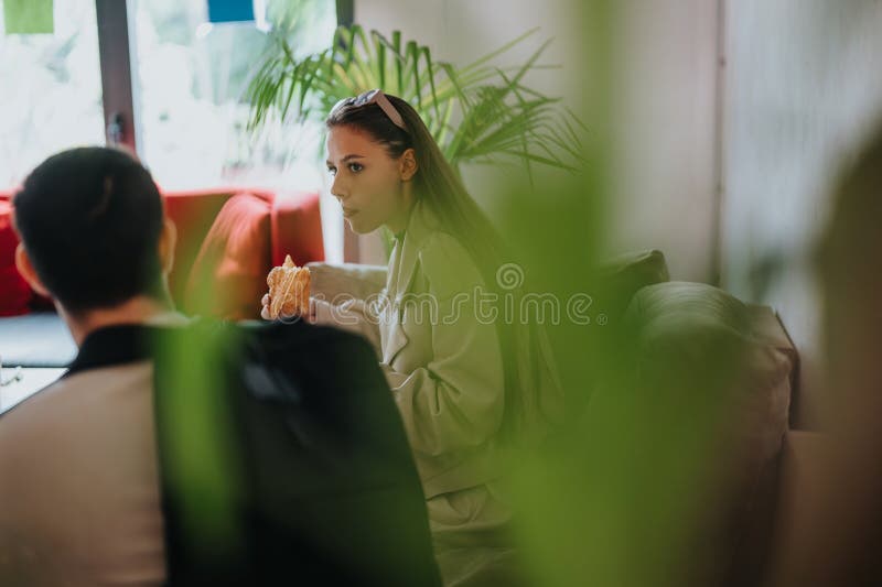 Students Enjoying Breakfast Together during School Break in Cozy ...