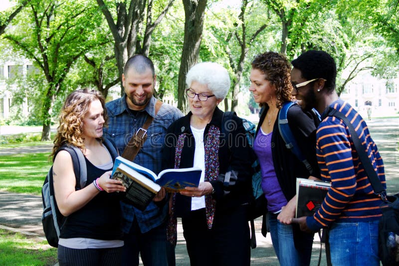 Students Enjoying a Chuckle with Professor Stock Image - Image of adult ...