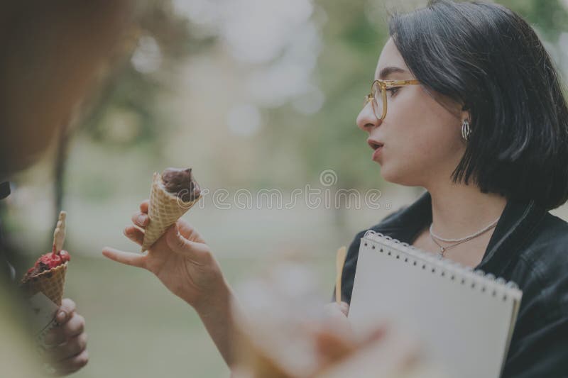 Students Enjoying Ice Cream with Professor after Classes Outdoors Stock ...