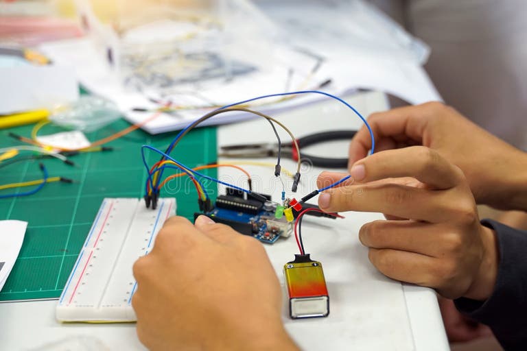 Students Experiment with Simple Electronic Circuits. Stock Photo ...