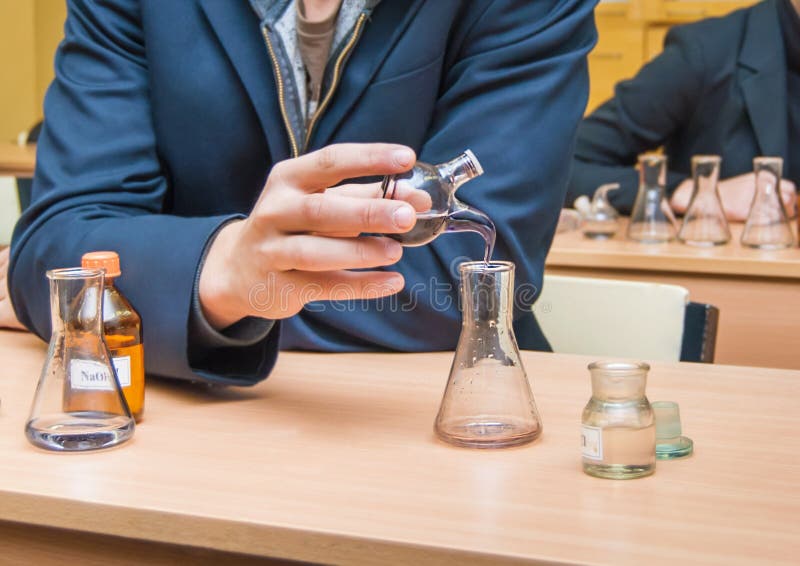 Students Experimenting and Discovering in Science Class Stock Image ...