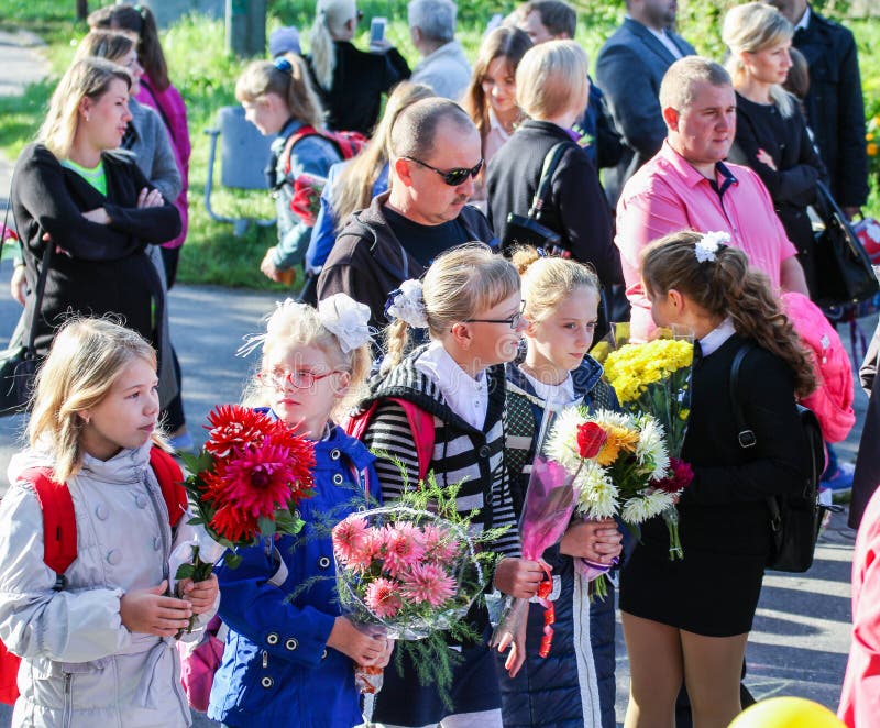 Students with flowers. editorial photo. Image of street - 76722326