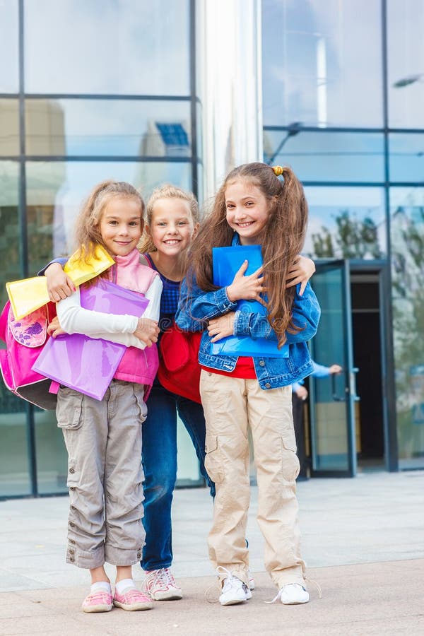 Students in Front of the School Stock Photo - Image of laughing, autumn ...