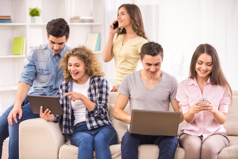 Students with gadgets stock image. Image of internet - 56341583