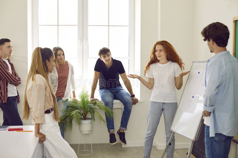 Students Girl and Guy Making Presentation Using Flipboard in Modern ...