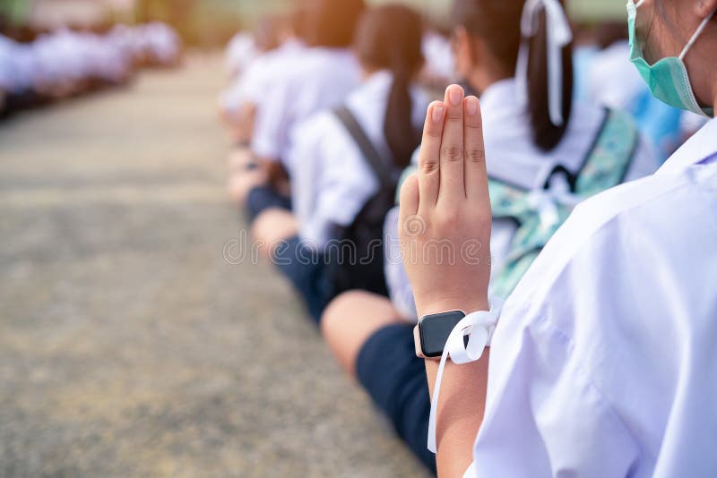 Students Girl Showing Three Finger Salute in School Stock Image - Image ...