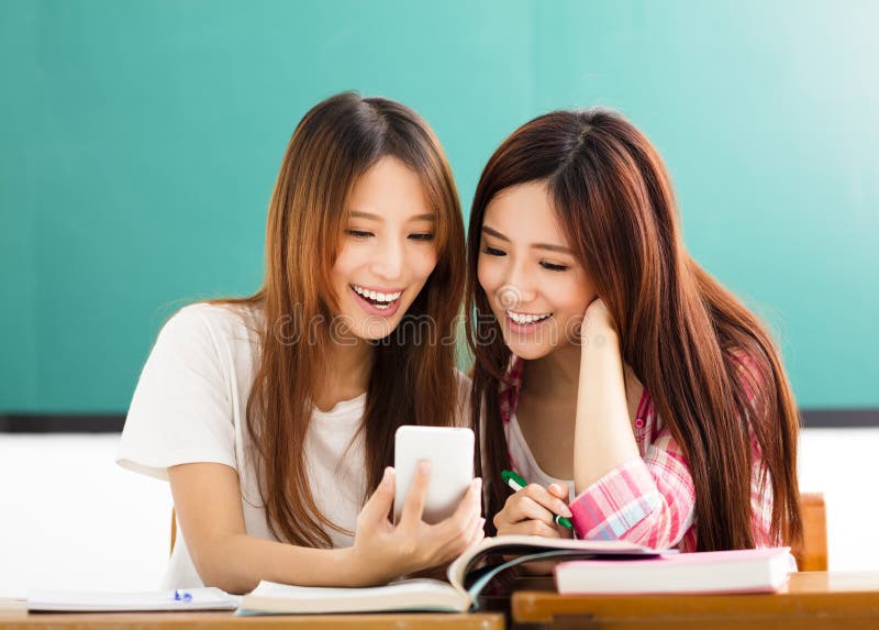 Students Girls Watching the Smart Phone in Classroom Stock Photo ...