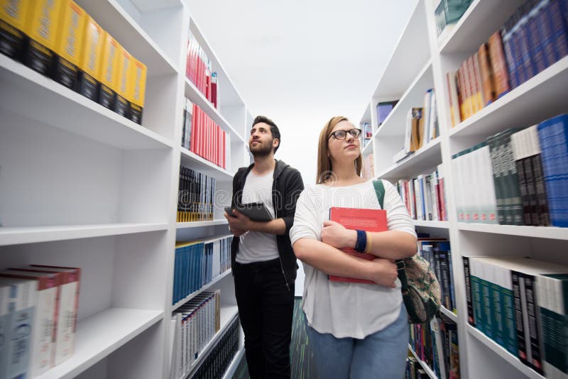 Students Group in School Library Stock Photo - Image of computer ...