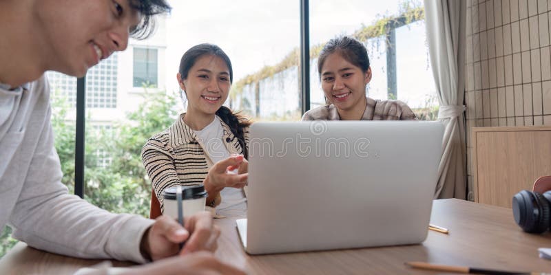 Students in Group Study Session with Laptop in Modern Setting Stock ...