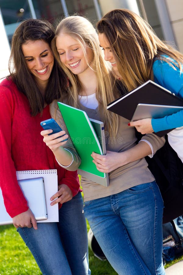 Students Having Fun with Smartphones after Class Stock Image - Image of ...