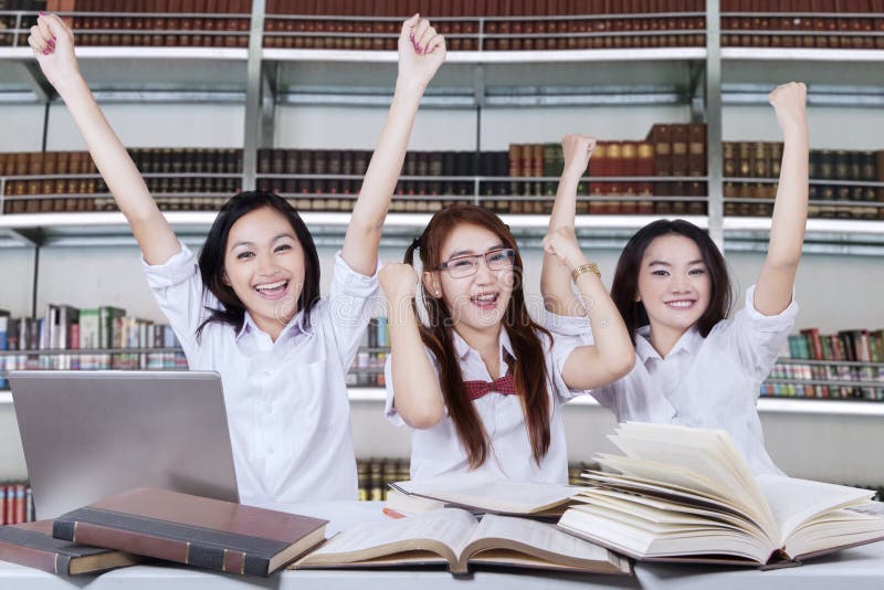 Students Having a Group Meeting in Library Stock Image - Image of ...