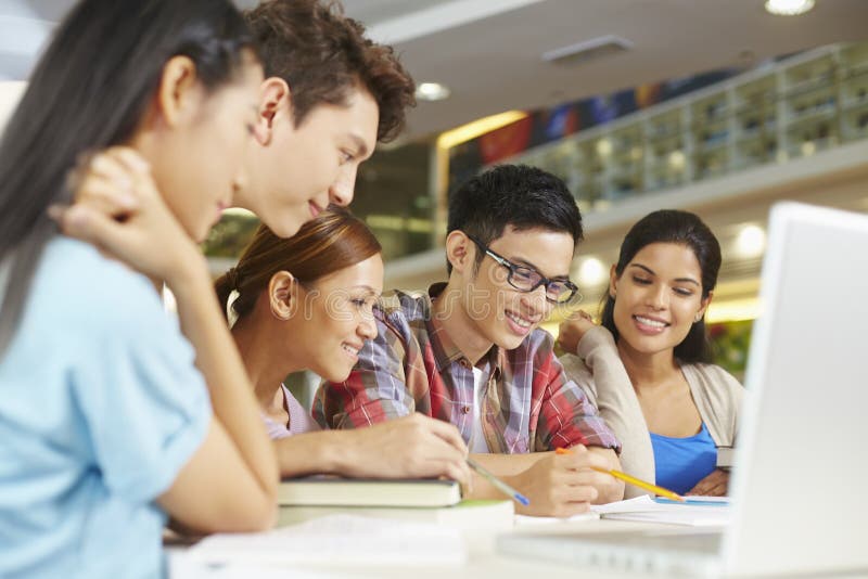 Students Having Study Group in Library. Conceptual Image Stock Photo ...