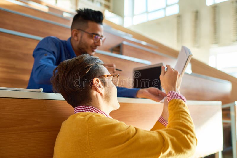 Students Helping Each Other Stock Image - Image of people, hall: 114633307