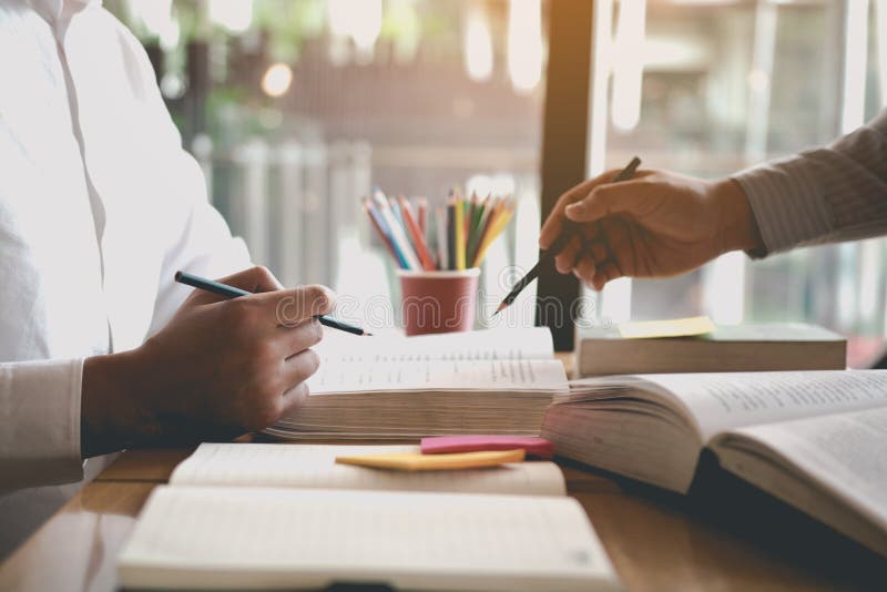 Students Helping Each Other Do Their Homework Stock Image - Image of ...