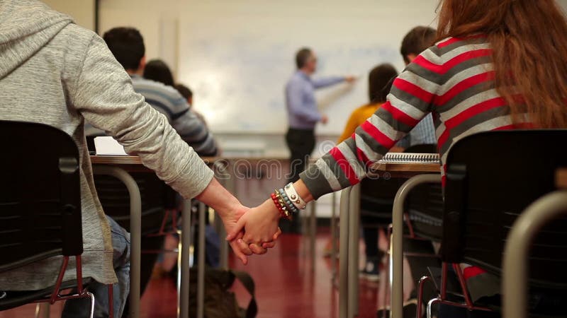 Students Holding Hands in Class Stock Footage - Video of working, adult ...