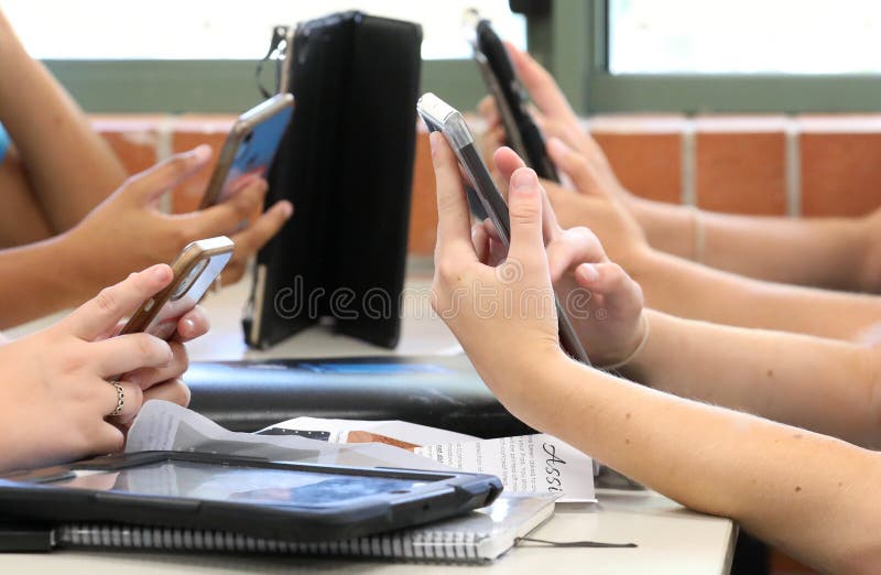 Students Using Digital Technology in the Classroom. Stock Photo - Image ...