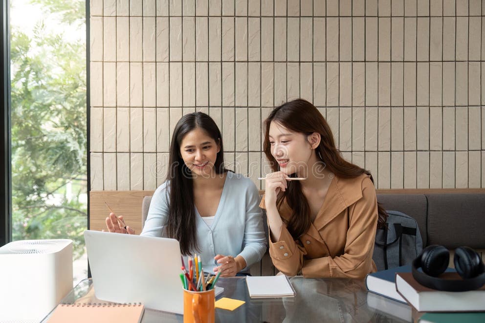 Academic Engagement and Teamwork. Two University Students Collaborating ...