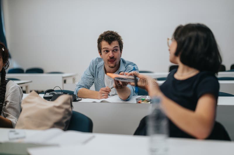 Students Interacting during a Class Session in a University Lecture ...