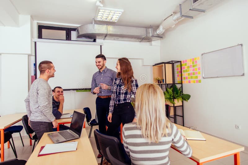 Students Interacting on Class Stock Photo - Image of education, laptop ...
