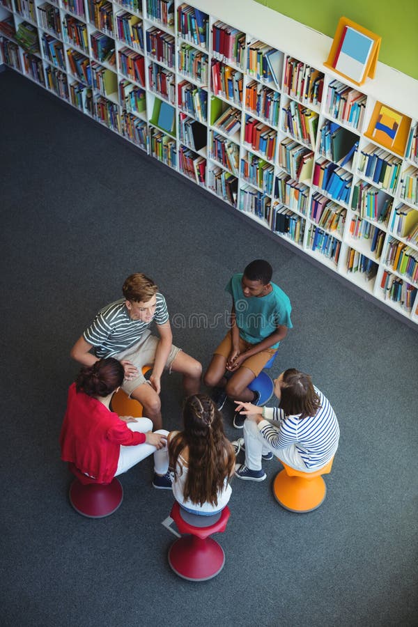 Students Interacting with Each Other in Library Stock Photo - Image of ...