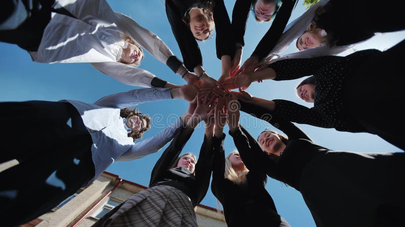 Students Joining Hands in a Circle, Representing Unity, Friendship, and ...