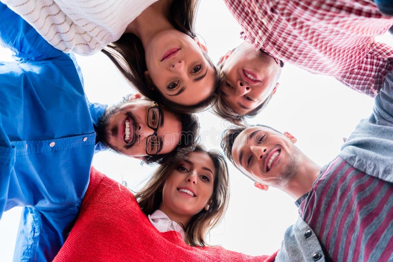 Students with Joint Project Sticking Heads Together Stock Image - Image ...