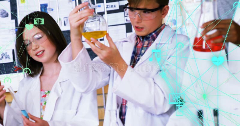 Students in Lab Coats Conducting Experiments with Scientific Data Image ...