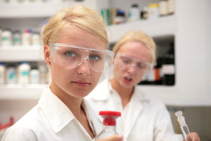 Students in the laboratory stock image. Image of education - 10833153