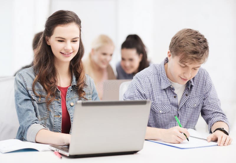Students with Laptop and Notebooks at School Stock Image - Image of ...