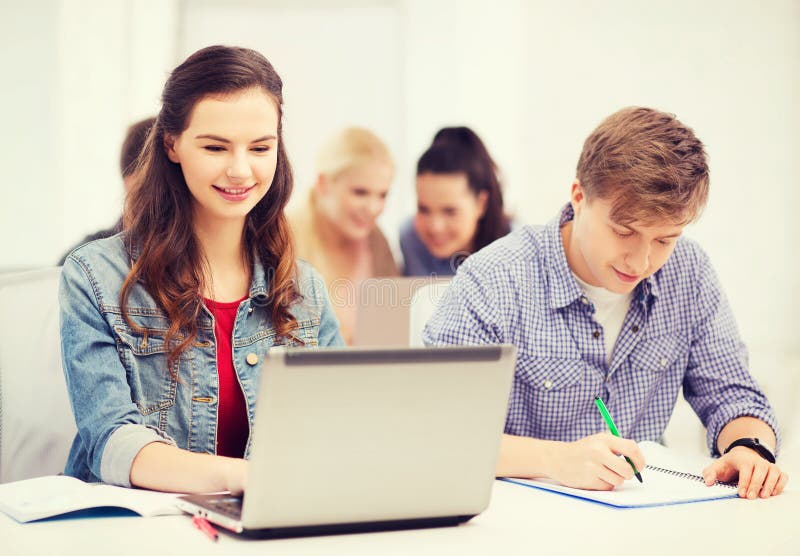 Students with Laptop and Notebooks at School Stock Photo - Image of ...