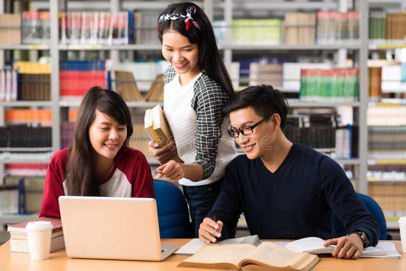 Students with laptop stock image. Image of asian, pointing - 51026077