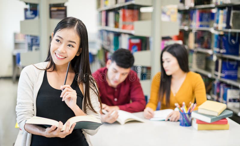 Students leading book stock image. Image of young, studying - 99131957